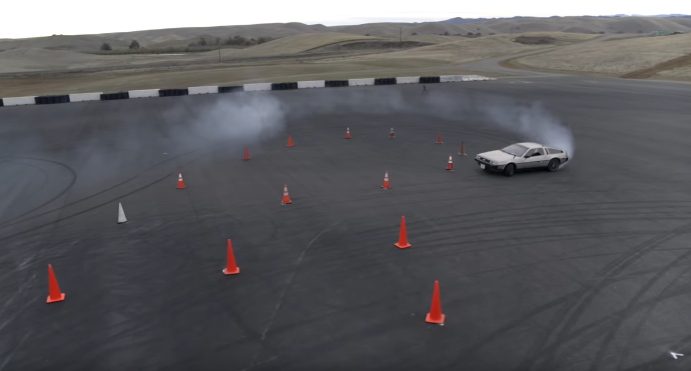 Watch A Self-Driving DeLorean Drift An Autocross Course With Ease
