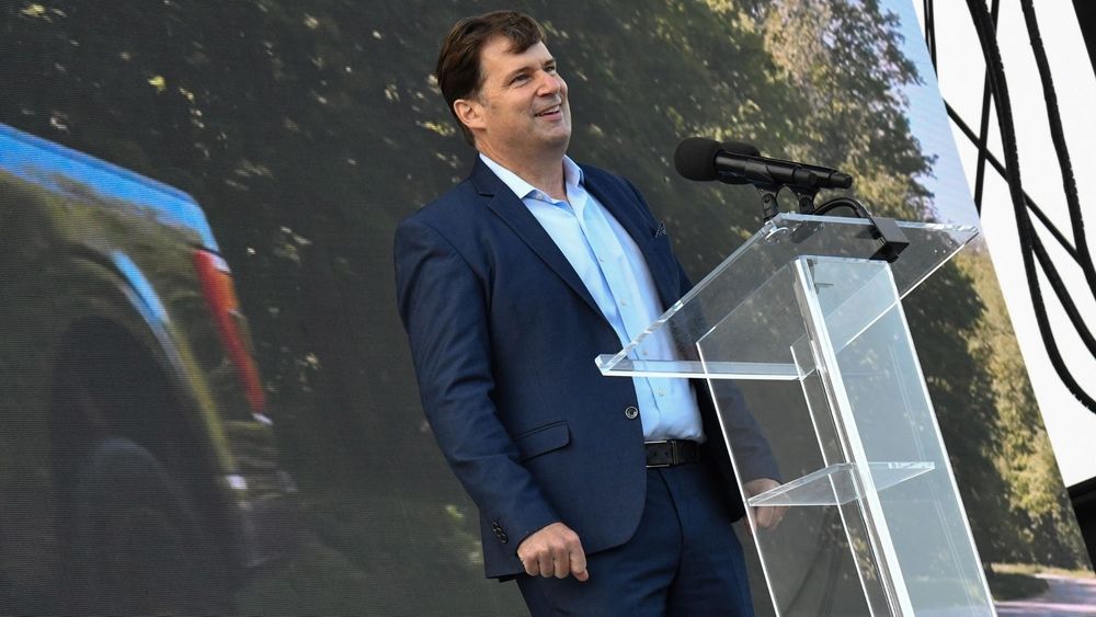 Ford CEO Takes Checkered Flag In Race