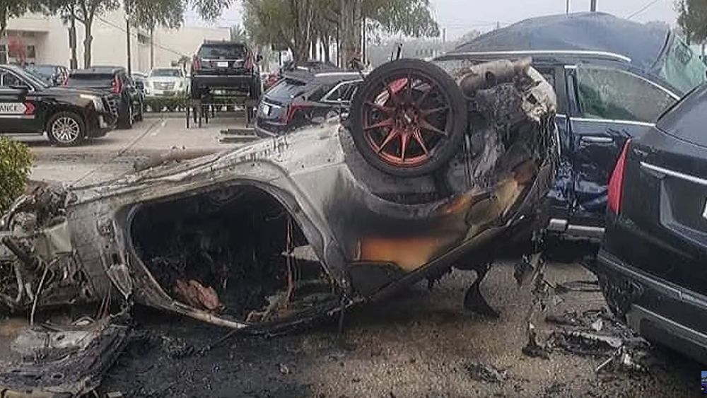 Watch A Nissan 350Z Bring A Cadillac Dealership To Its Knees