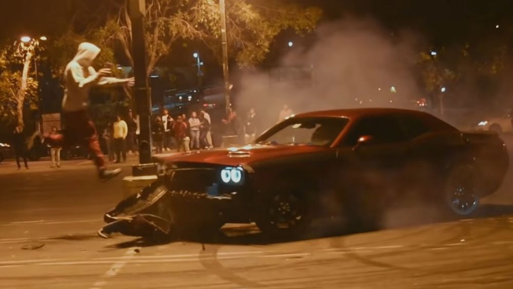 Dodge Challenger Doing Donuts Almost Hits Bystander