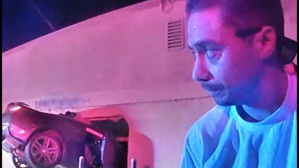 Gang Member Launches Camaro Into Building