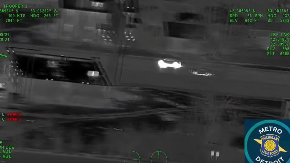 Michigan Street Racers Hide From Cops In Dumpster