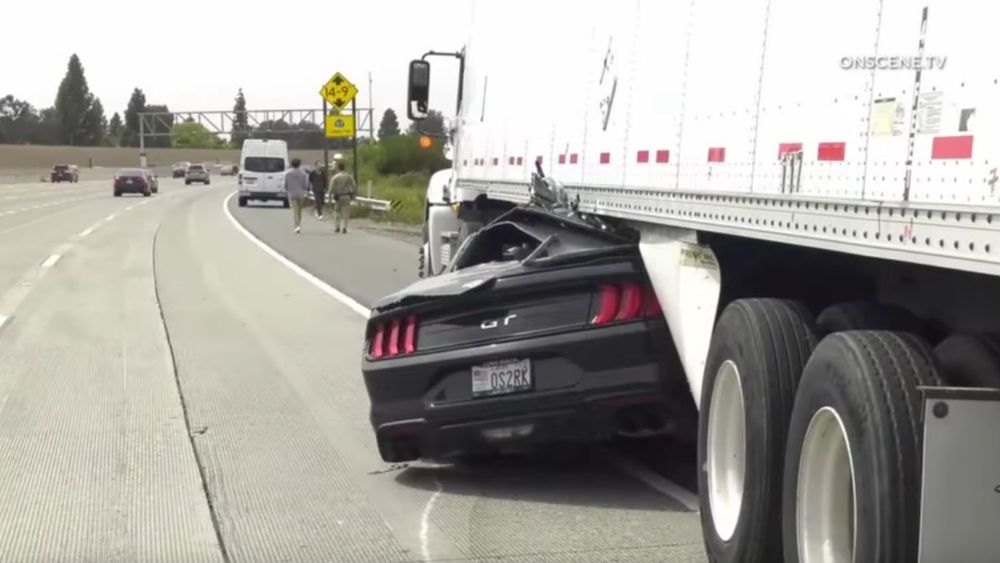 Mustang Slides Under Semi In Scary Crash